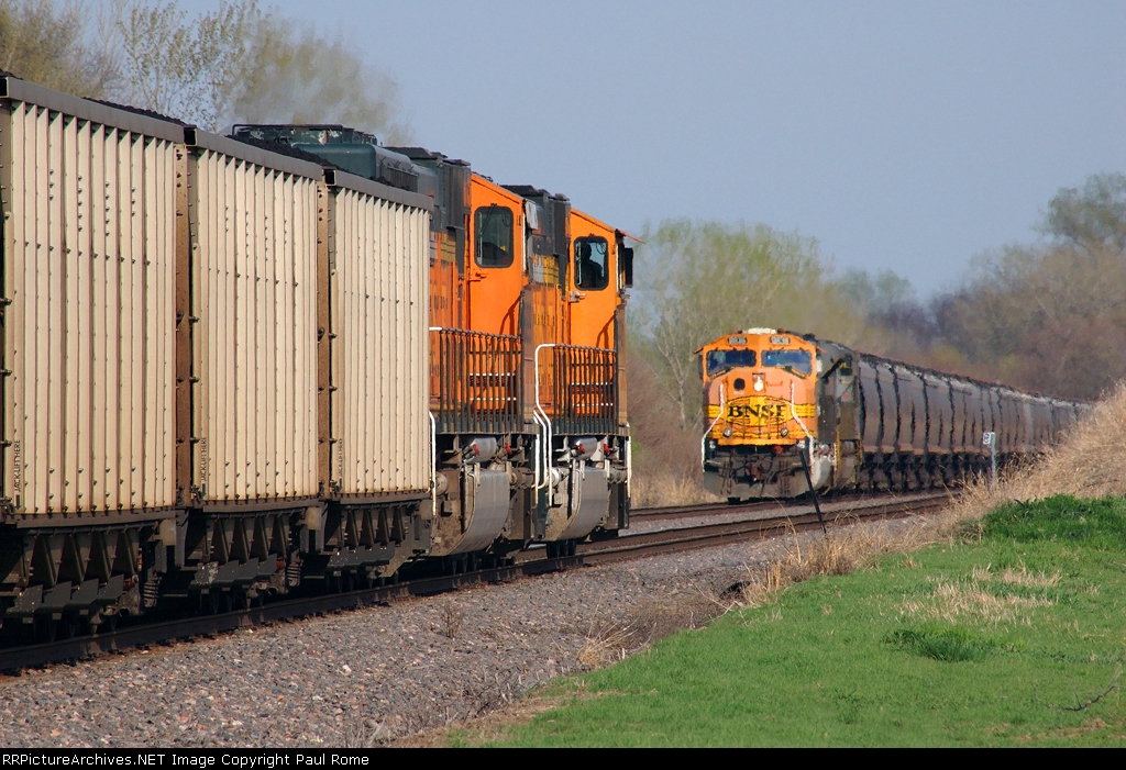 BNSF SD70MACs meet, 9941-8899 with eastbound coal, and 8838 with westbound KCS grain train